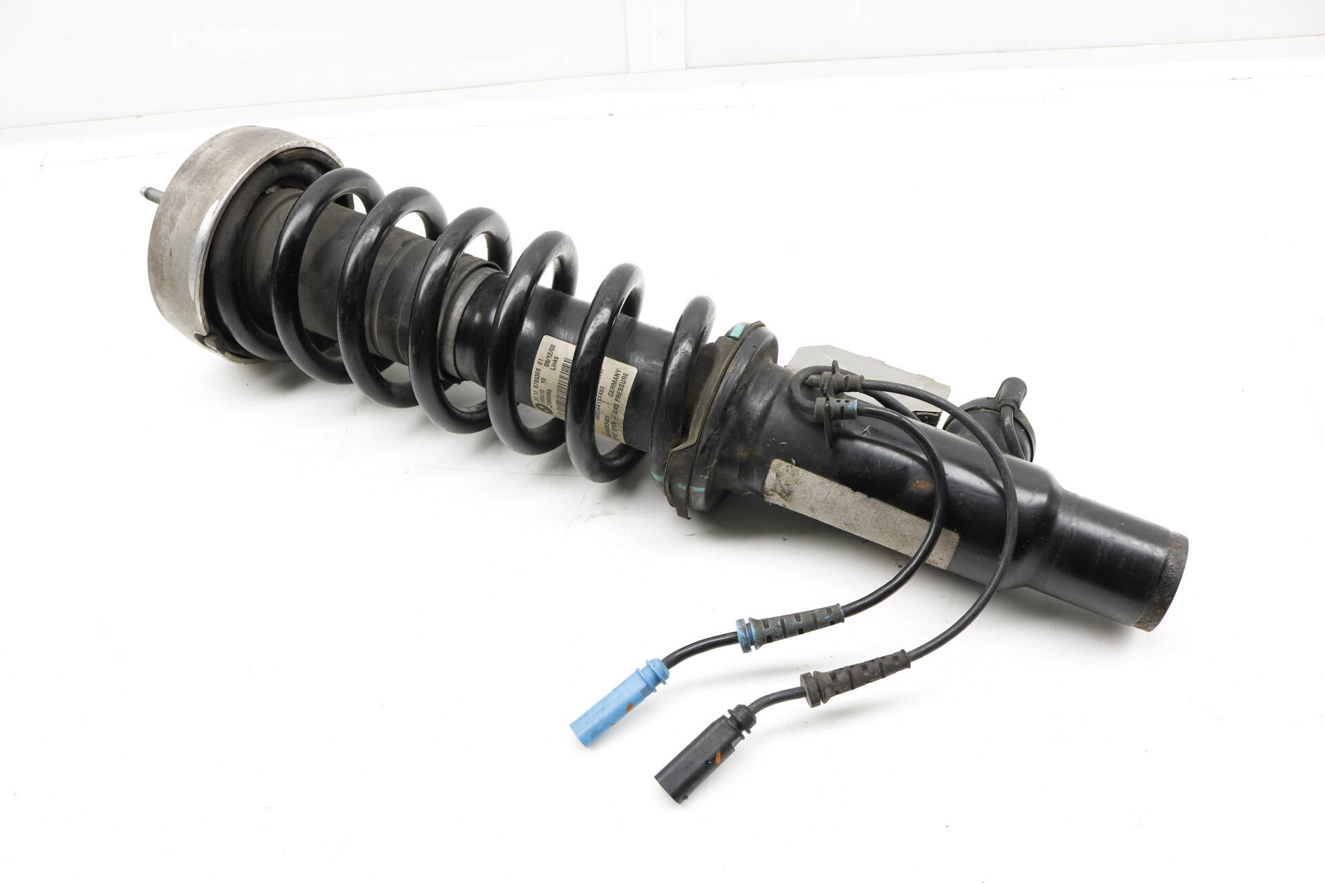 FRONT LEFT - STRUT / SHOCK ABSORBER - BMW X5 - 37116785369