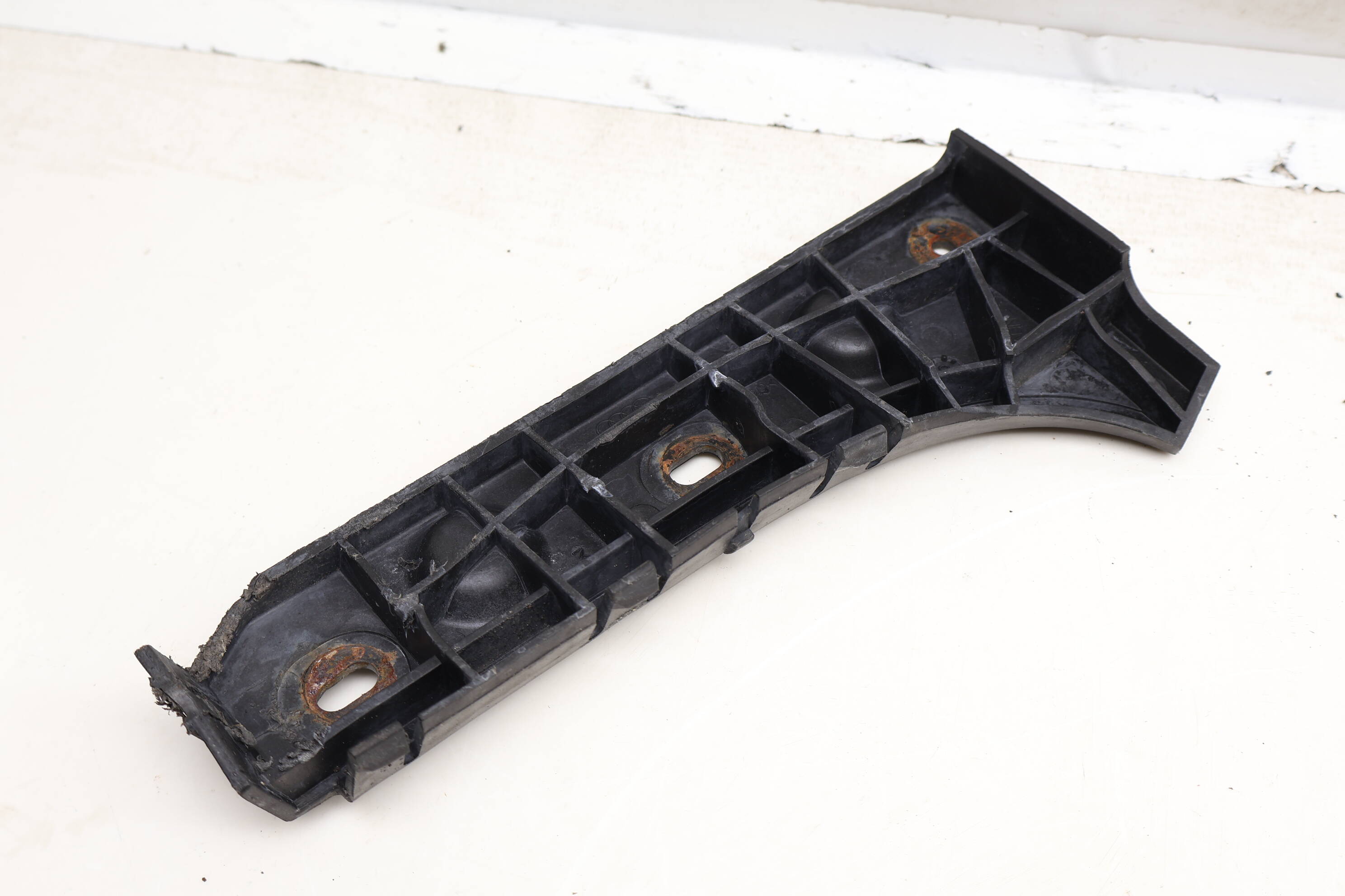 Audi Front Left Bumper Mount Bracket / Guide 4B0807283B