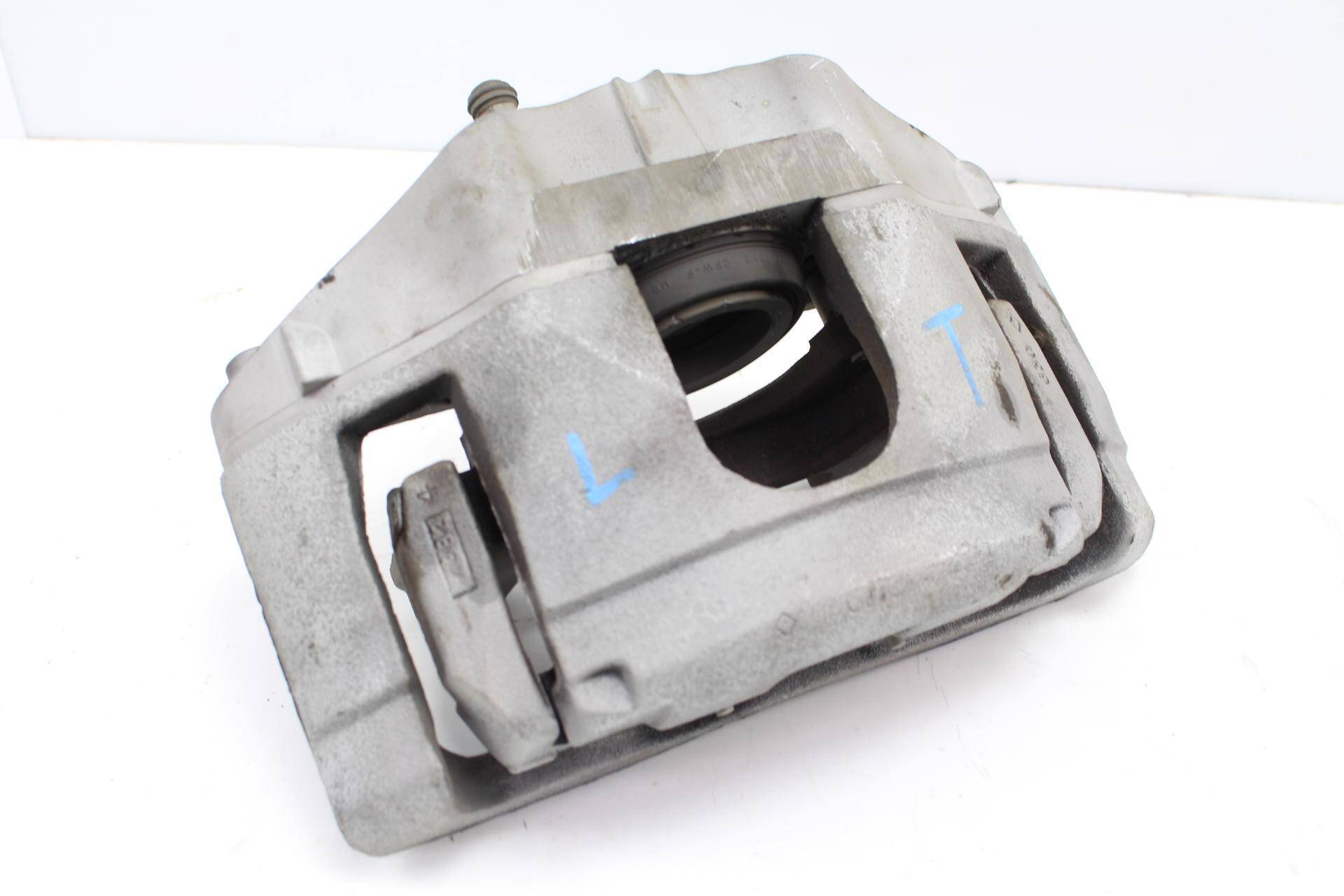 Audi Front Left Brake Caliper W/ Carrier 4B0615123A