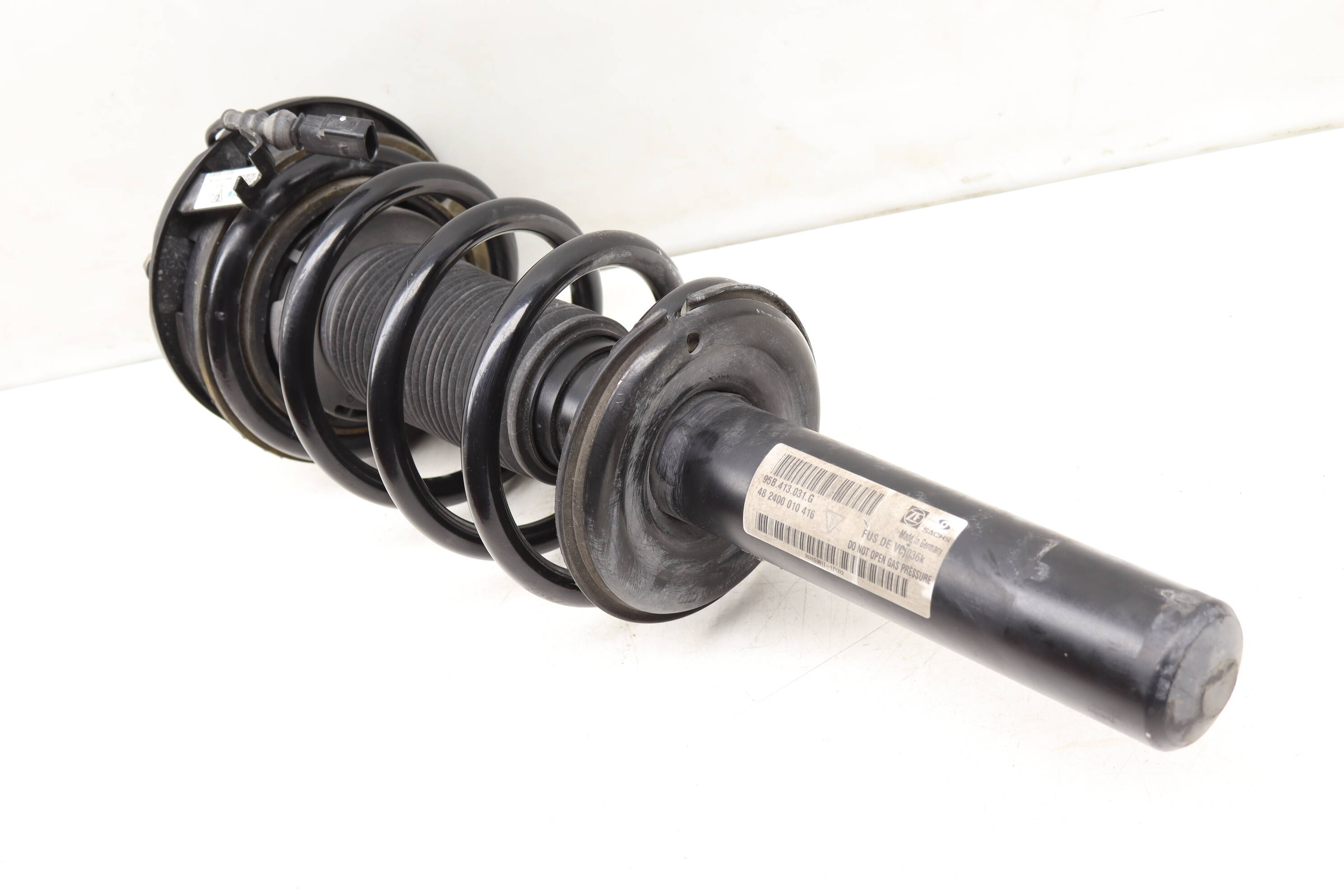 Porsche Front Left Strut / Shock Absorber Assembly 95B413031G