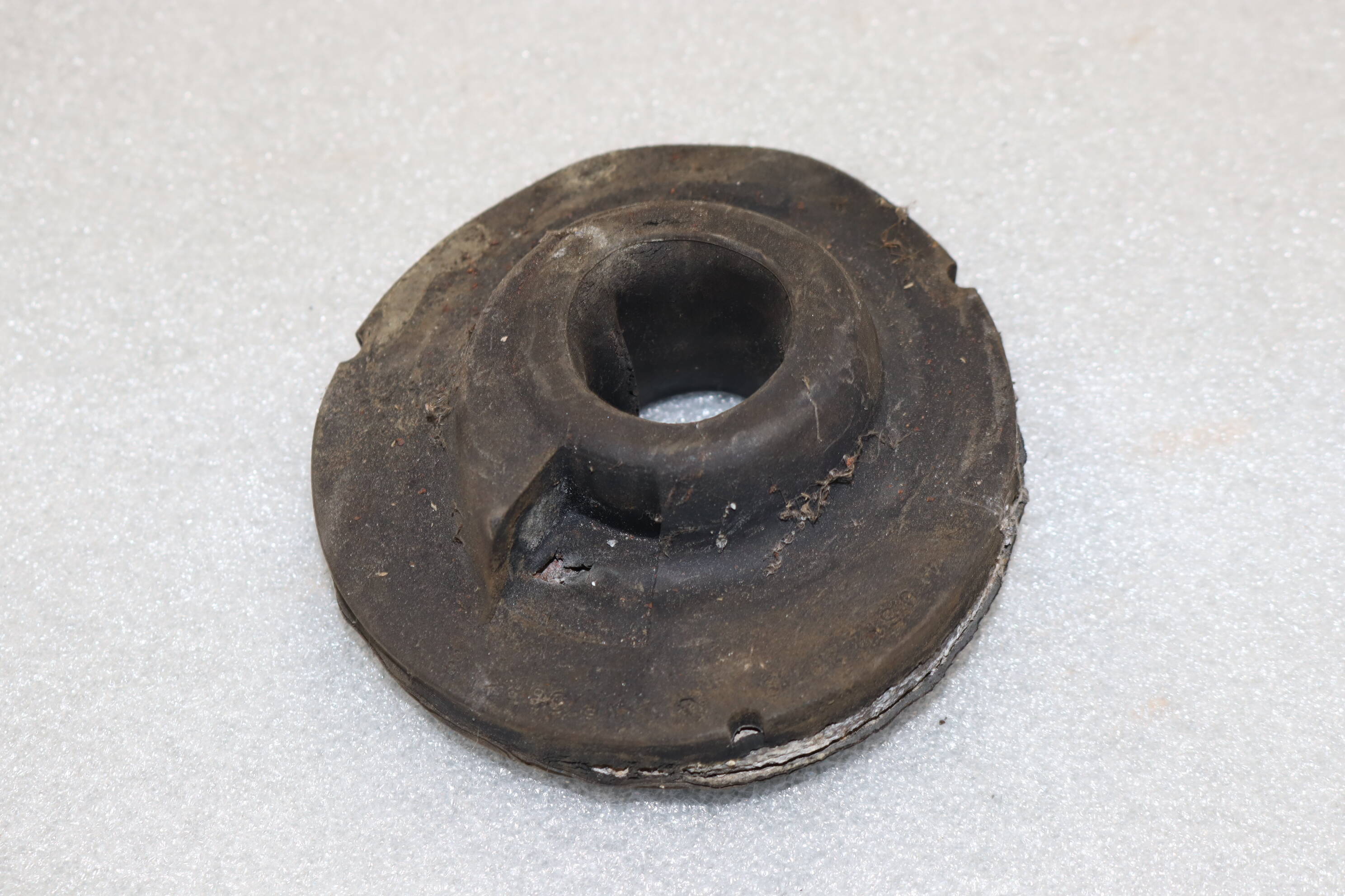Audi Rear Lower Coil Spring Bushing / Mount 4F0512297B